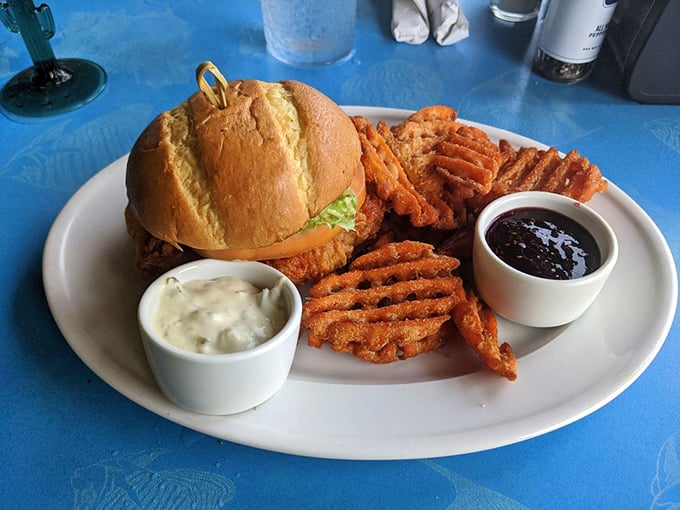 This isn't just a sandwich—it's Florida architecture: sturdy foundation, perfect construction, and topped with something orange that makes everyone happy.