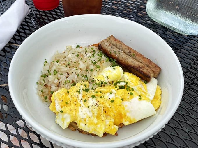 The hashbrown bowl—where crispy potatoes cradle eggs and cheese in a relationship that makes Romeo and Juliet look casual.