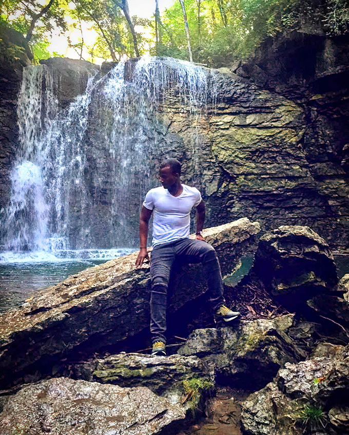Finding your moment of zen beside rushing water. This peaceful spot offers the perfect perch for contemplation—nature's version of a meditation app.