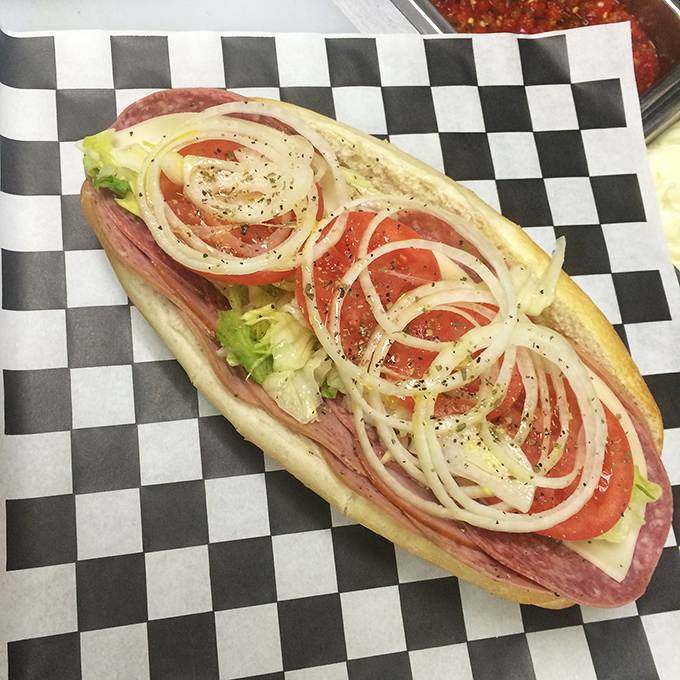 The Italian hoagie—a architectural marvel of meats, cheese, and veggies that makes you wonder why you'd ever eat a boring sandwich again.