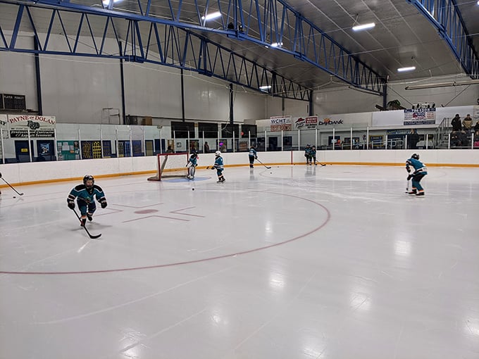Future hockey stars chase pucks across Escanaba's indoor rink, where winter sports aren't just activities – they're practically religion in the U.P.