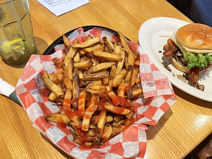 These aren't just fries—they're golden happiness sticks. Crispy on the outside, fluffy inside, and served with enough ketchup to satisfy even the most enthusiastic dipper.