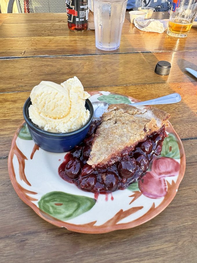 The cherry pie arrives with ice cream slowly melting into rivers of sweet-tart Michigan goodness—proof that cherries weren't just put on Earth for garnishing cocktails.
