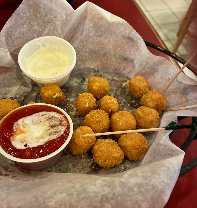The legendary hot cheese balls in their natural habitat—golden, crispy outside, molten inside, and worth every mile of the drive.