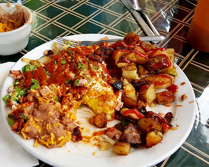 A fiesta on a plate! These huevos rancheros don't just wake you up—they throw open the curtains and play mariachi music in your mouth.
