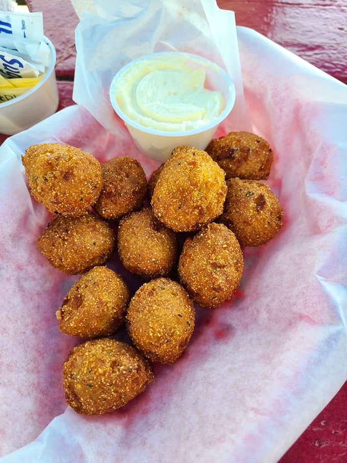 Hush puppies so perfectly golden they deserve their own trophy. Crispy outside, fluffy inside—the supporting actors that steal every scene.