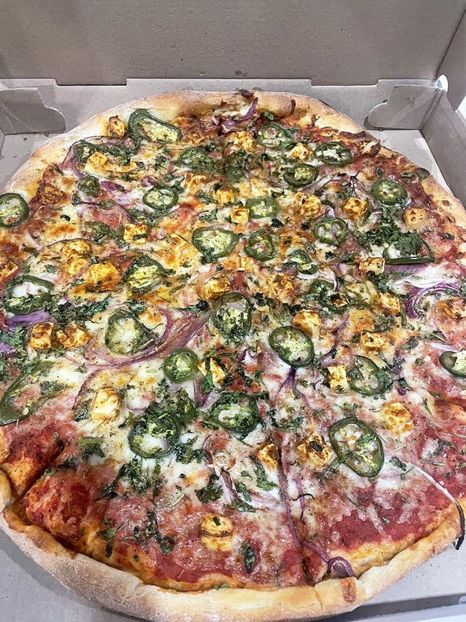 This Indian pizza loaded with jalapeños shows what happens when culinary worlds collide in beautiful ways.