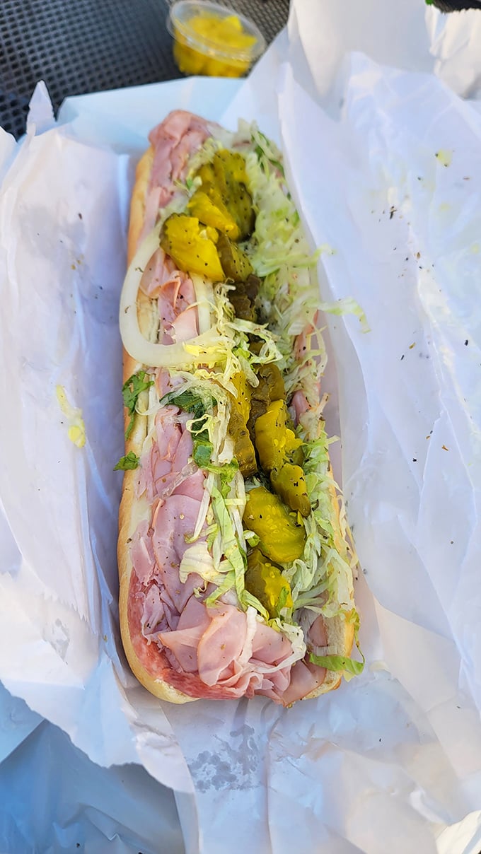 This Italian hoagie isn't just a sandwich—it's an architectural marvel of cured meats, sharp provolone, and precisely shredded lettuce. Napkins are non-negotiable.