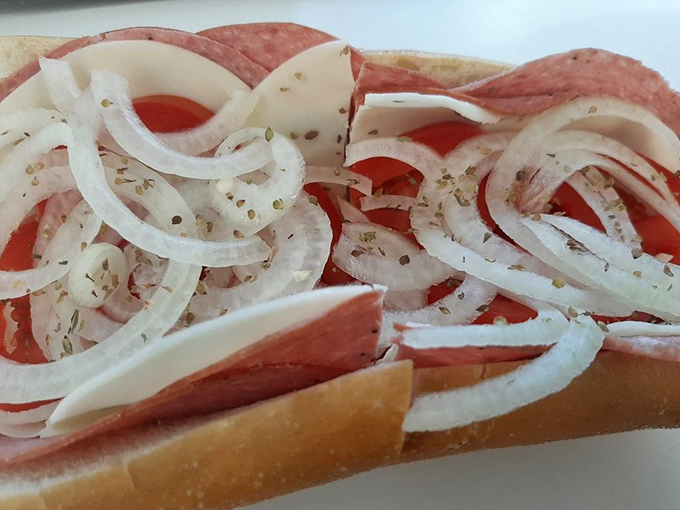 The Italian hoagie at Speck's doesn't need fancy frills—just the perfect ratio of meat, cheese, and those paper-thin onions that make everything better.