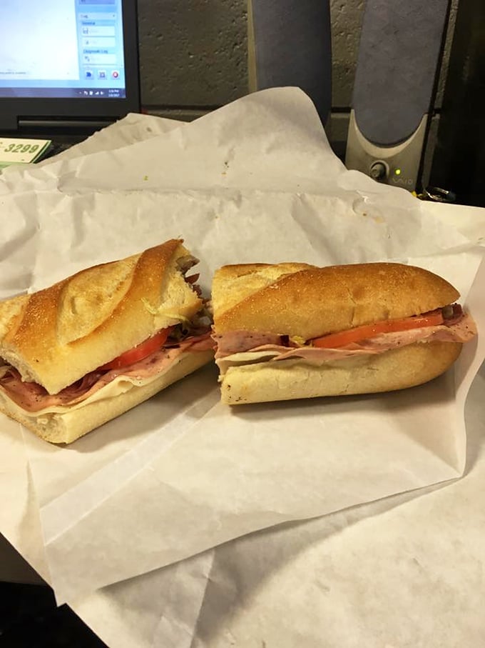 Two halves make a whole story – crusty bread, thinly sliced meats, and fresh toppings creating a lunch that's worth crossing county lines for.