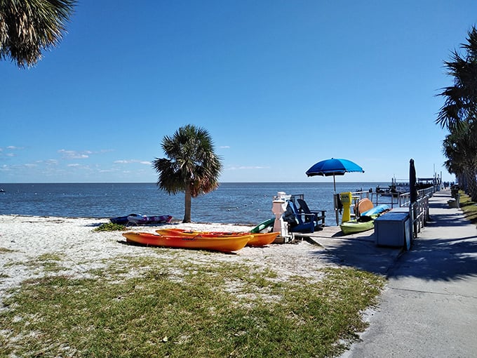 A kayak waiting patiently for its next adventure – Cedar Key's calm waters promise encounters with dolphins, manatees, and the rare phenomenon of complete tranquility.