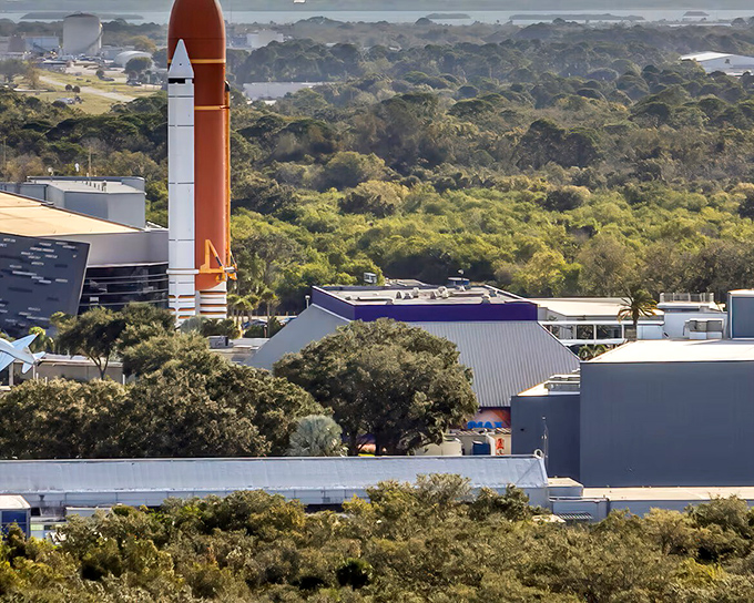 Your neighbor Kennedy Space Center – because nothing says "good morning" quite like a rocket launch over breakfast.