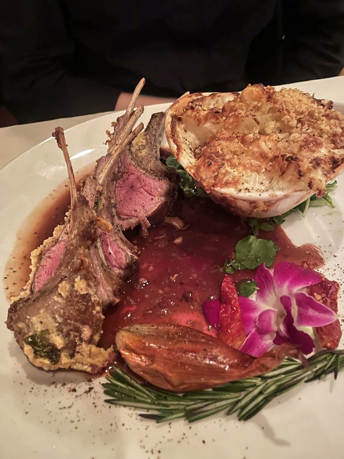 Rack of lamb presented like edible art, with each bone standing at attention. The pink center whispers, "They know exactly what they're doing in that kitchen."