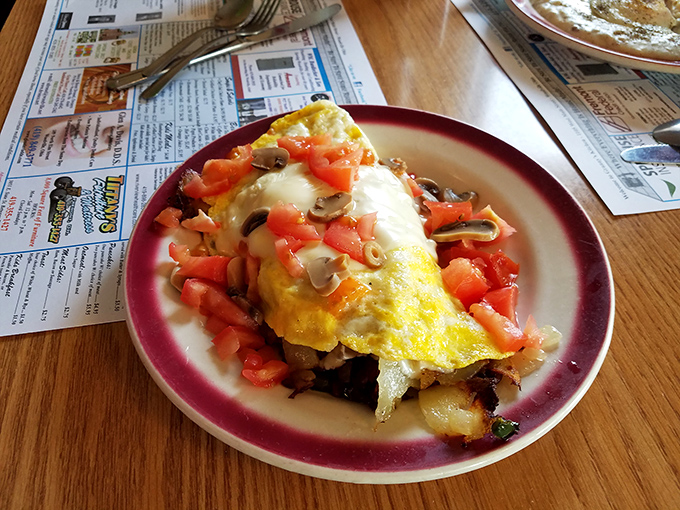 This omelet's packing more goodies than a Christmas stocking - and it's available year-round, thankfully.