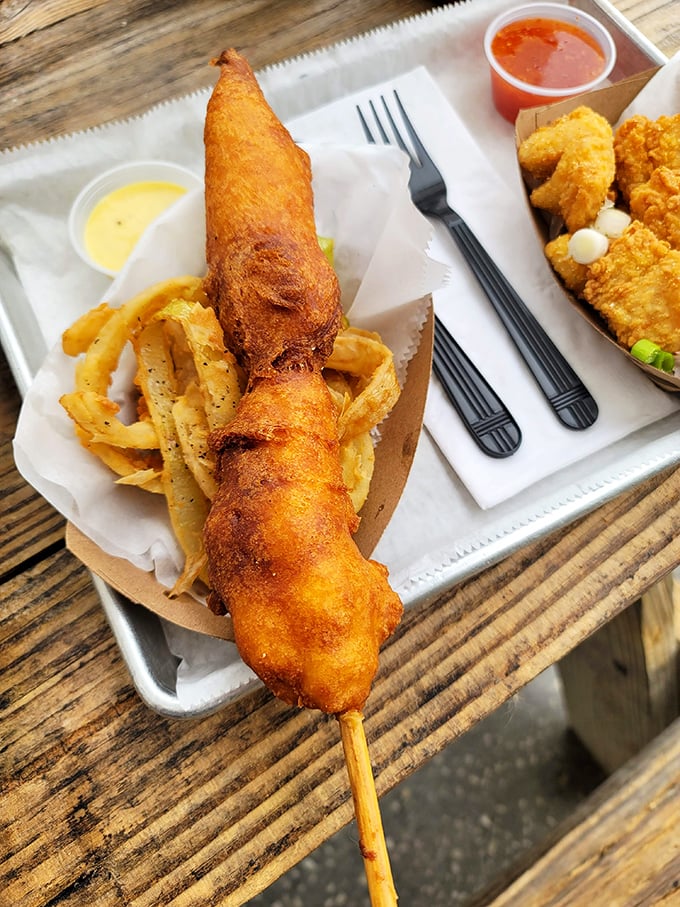 The lobster corn dog might sound like culinary madness, but one bite of this sweet-meets-savory masterpiece will have you questioning all your life choices.