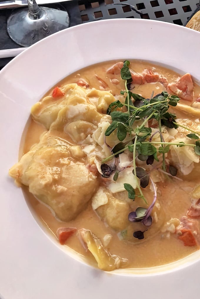 Not just soup, but a seafood symphony – chunks of lobster and pillowy dumplings swimming in a broth that deserves its own love song.