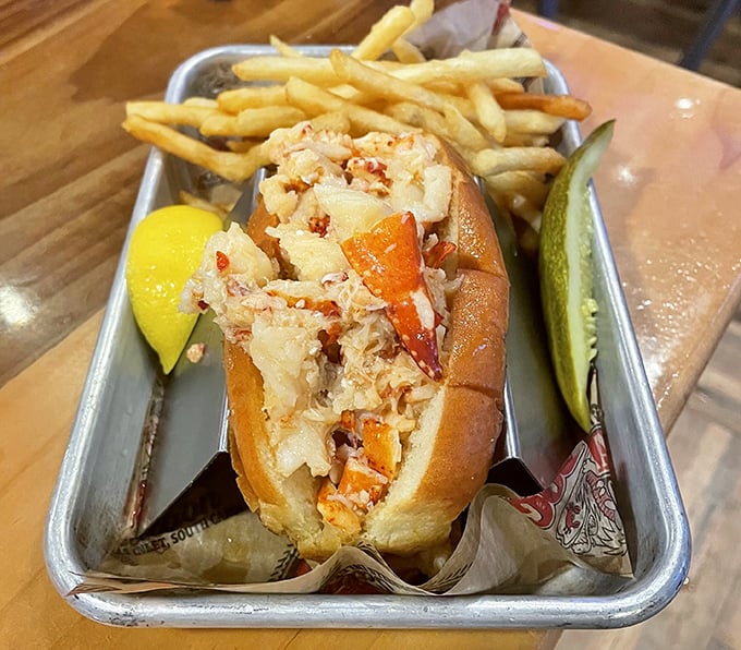 The lobster roll—a buttery, toasted vessel cradling sweet chunks of lobster meat. Simplicity that somehow manages to be life-changing.