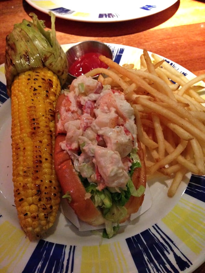 The lobster roll – where sweet chunks of Maine's finest meet minimal interference. Sometimes simplicity is the ultimate sophistication.