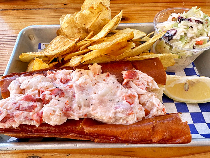 The perfect lobster roll doesn't exi— Oh wait, here it is! Chunks of sweet meat nestled in buttery bread with homemade chips standing guard.
