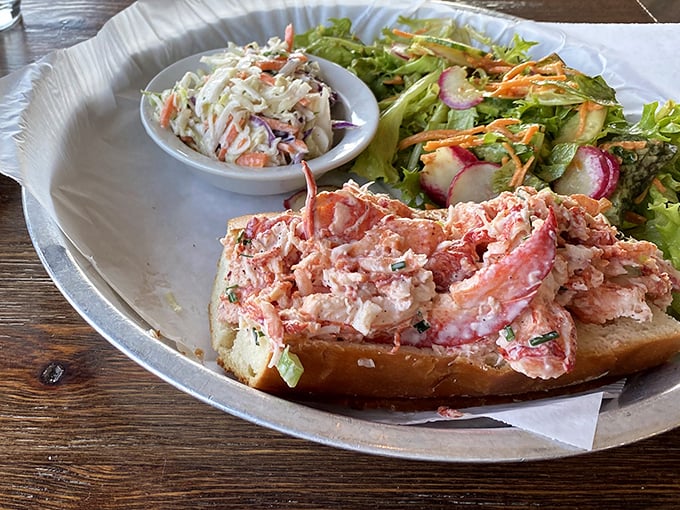The lobster roll that launched a thousand road trips—chunks of sweet lobster meat nestled in a perfectly toasted bun with a side of slaw.