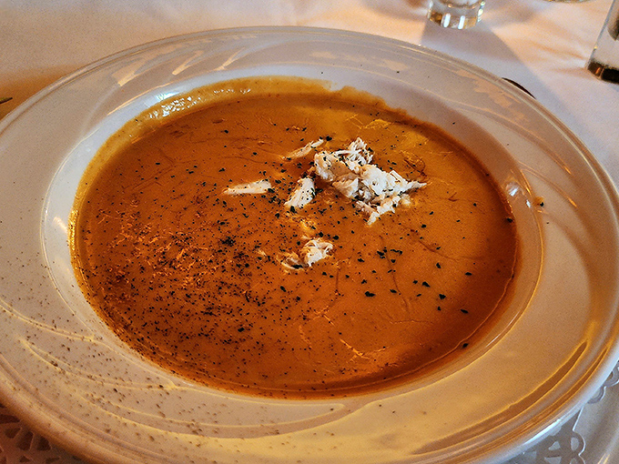 This lobster bisque arrives with the kind of rich, velvety sophistication that makes fancy restaurants in Chicago jealous.
