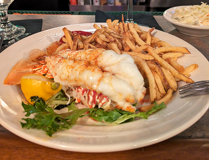 Lobster tail and crispy fries – proof that sometimes the most perfect culinary partnerships don't need fancy introductions, just plenty of napkins.