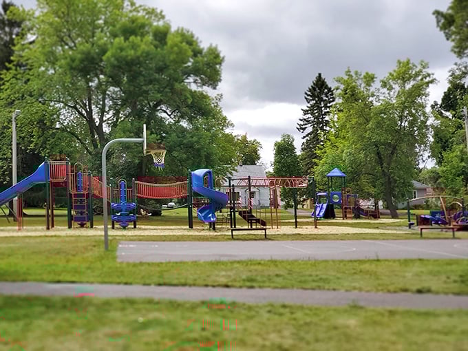 Longyear Park offers childhood joy without a monthly subscription fee—just good old-fashioned slides and swings under a canopy of Michigan greenery.