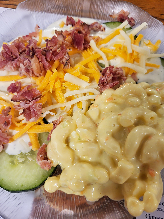 This isn't just mac and cheese—it's a creamy, golden hug in a bowl, accompanied by a salad that somehow makes you feel virtuous.