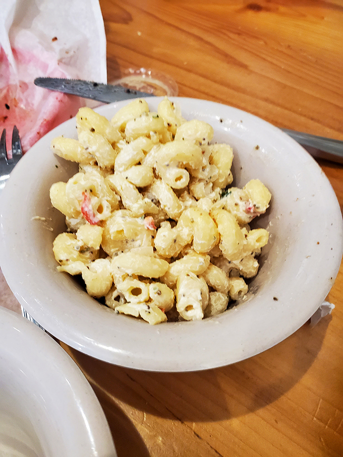 The humble macaroni salad, elevated to art form. Those little pasta elbows are swimming in creamy goodness like tiny synchronized swimmers in a delicious pool.