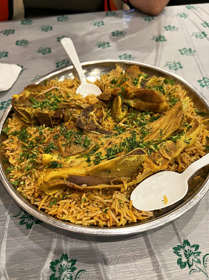 This isn’t just Mandi Lamb Shank – it’s an edible work of art. The meat practically surrenders to your fork after its long, flavorful bath in spices.