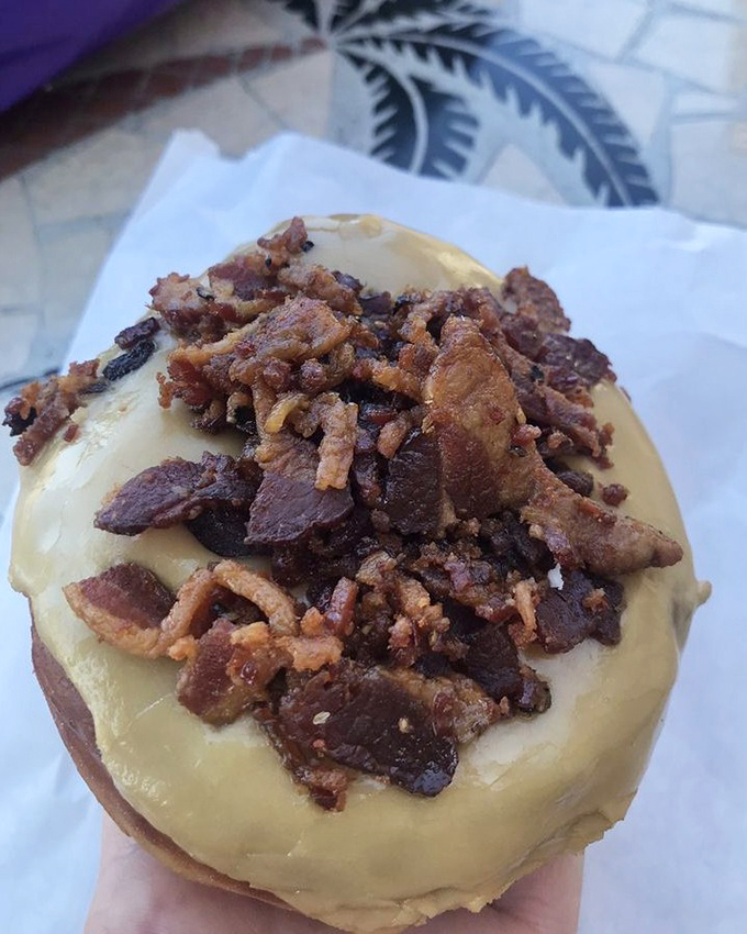 The maple bacon donut—where breakfast's greatest hits collaborate on one perfect stage. Sweet meets savory in a harmony that would make Mozart weep.