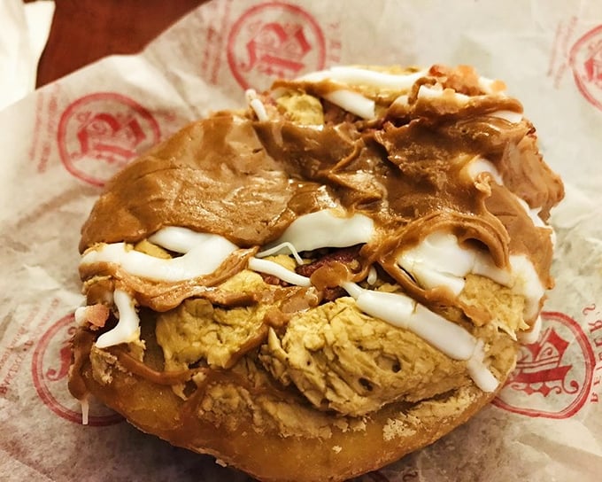 The maple bacon donut – where breakfast meets dessert in perfect harmony. Sweet maple glaze and savory bacon create a flavor symphony worth every calorie.