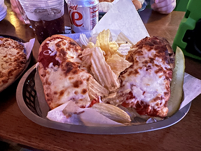 This meatball sub arrives looking like it means business – serious, delicious, cheese-covered business.