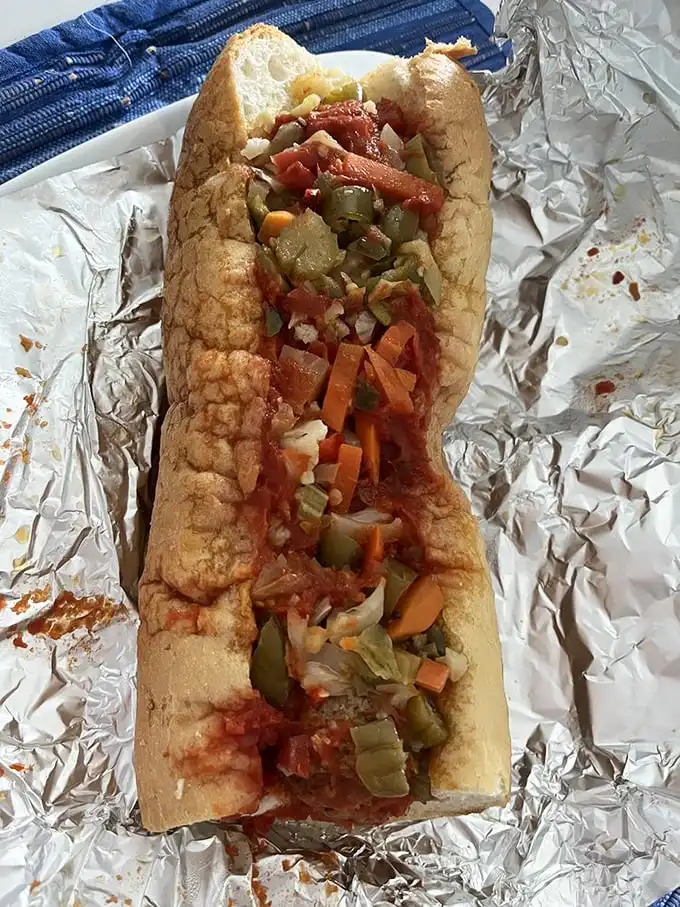 The Italian veggie sub isn't trying to win beauty contests—it's too busy delivering a symphony of flavors in every messy, magnificent bite.
