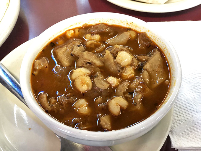 This menudo isn't just soup – it's a restorative miracle in a bowl. Tender tripe and hominy swimming in a broth that could cure anything from hangovers to heartbreak.