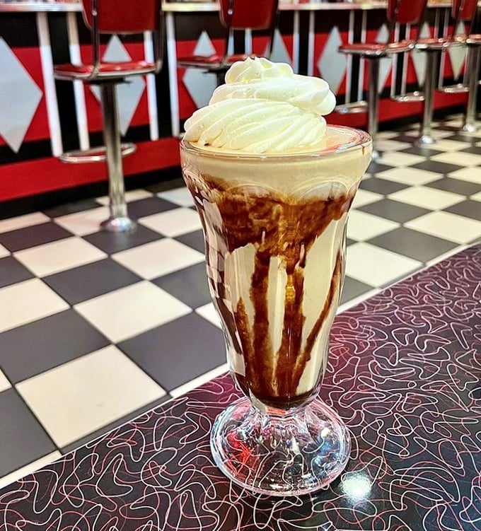This isn't just a milkshake—it's a dripping, chocolate-streaked masterpiece that requires both straw and spoon. Diet plans, beware!