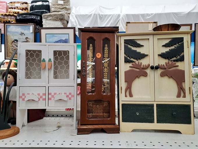 Miniature cabinets with personality to spare. That moose-adorned cupboard isn't just storage—it's a conversation waiting to happen.
