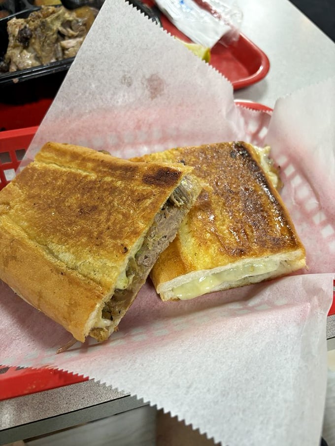 The Mojito Pork Sandwich doesn't need fancy plating—just look at those perfectly pressed edges creating a seal around that succulent, marinated pork.