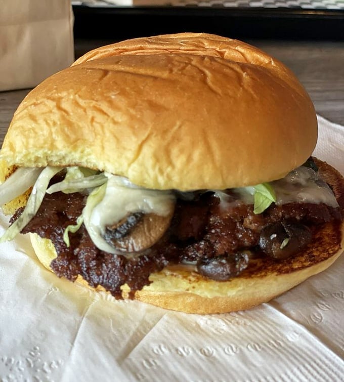 The Mushroom Swiss Burger doesn't just flirt with umami—it proposes marriage, sealing the deal with melted cheese and a perfectly toasted bun.