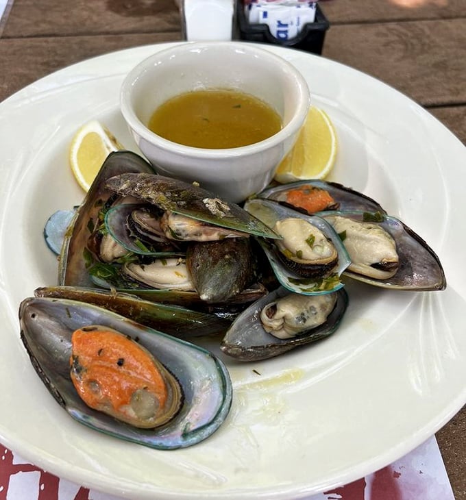 These mussels aren't just fresh—they're having a spa day in garlic butter before making their grand entrance to your taste buds.