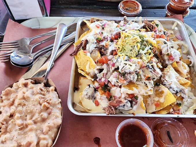 Nachos that laugh in the face of restraint. This isn't just loaded—it's the Olympic weightlifting champion of Tex-Mex indulgence.