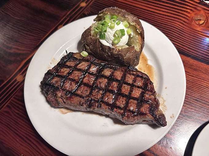 That crosshatch grill pattern isn't just for show—it's the signature of a steak that's been kissed by fire just the right amount of time.