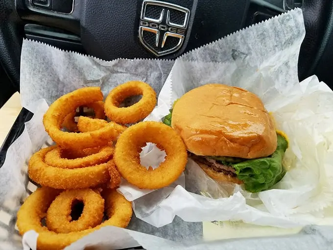 These aren't just onion rings and a burger—they're edible gold medals for surviving another workweek. Worth every delicious calorie.