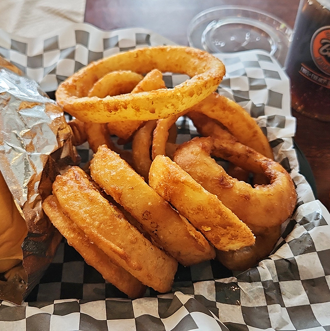 These onion rings aren't just appetizers, they're golden halos of happiness. Crispy enough to make that satisfying crunch heard three tables away.