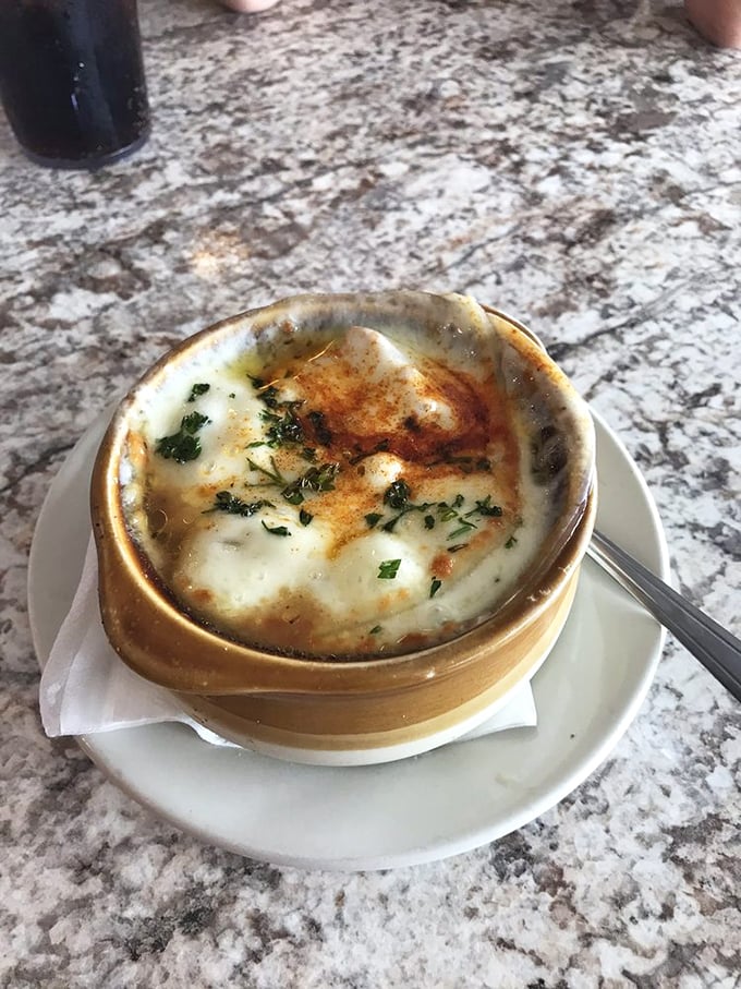 French onion soup that's having its glamour shot moment – the cheese pull potential here could win Olympic medals if they had such a category.