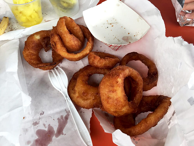 These aren't just onion rings; they're golden halos of crispy perfection that make the perfect supporting cast to the sandwich star of the show.