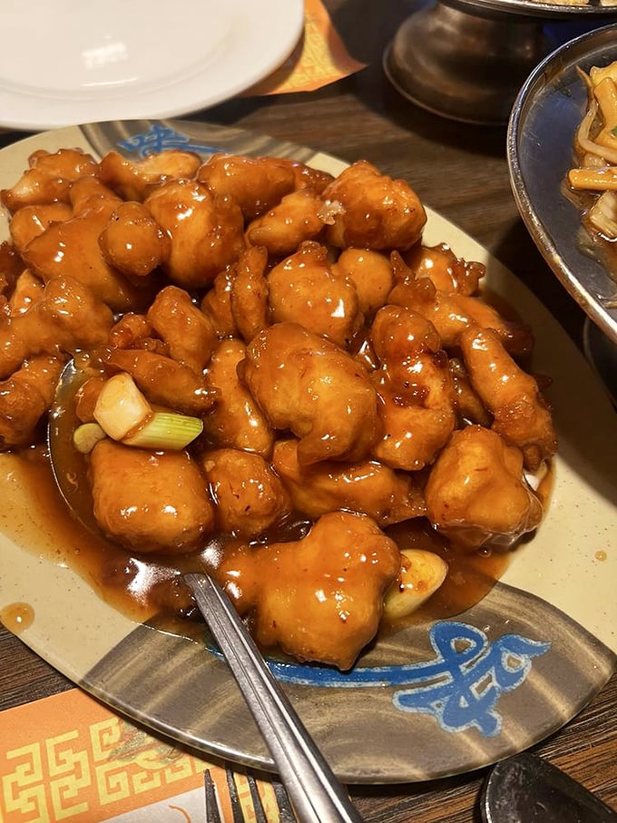Orange chicken that actually tastes like something besides sugar. These glossy morsels deliver the sweet-savory-tangy trifecta that keeps forks returning.