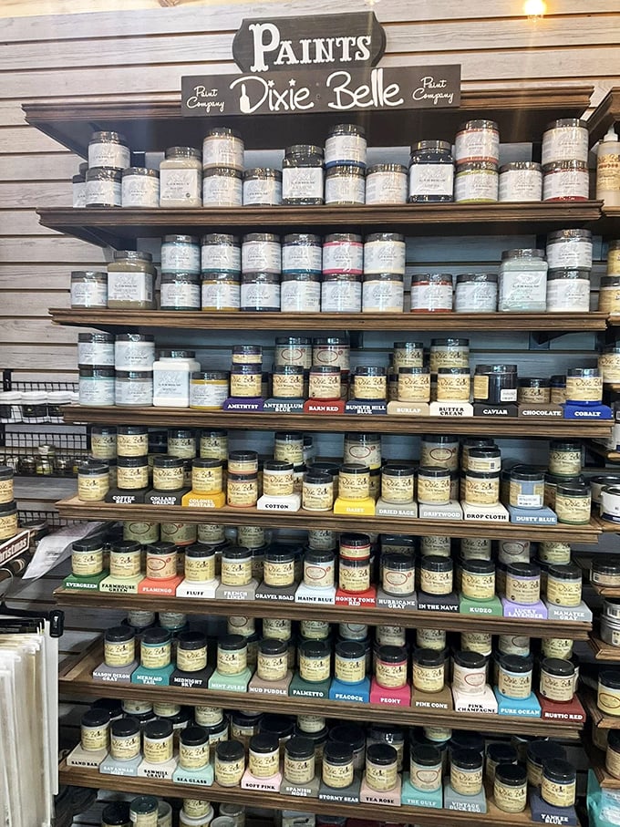 The Dixie Belle paint collection—more meticulously organized than my spice rack will ever be. Martha Stewart would approve of this color-coded wonderland.