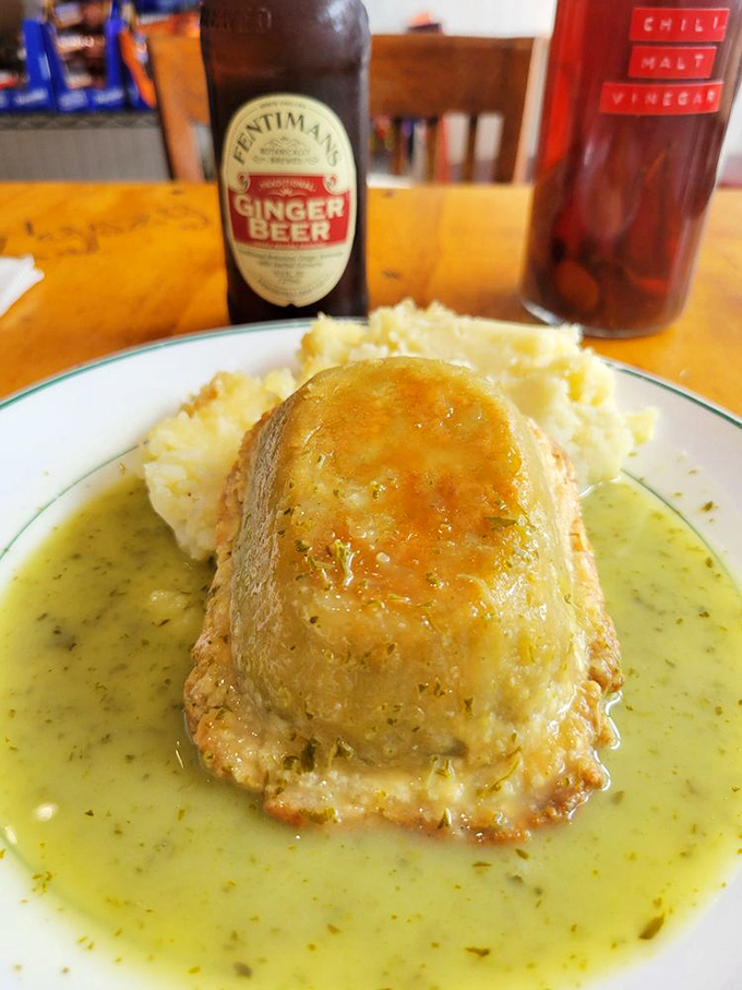 A proper pie swimming in parsley liquor with a side of mash. This isn't food—it's edible therapy for homesick Brits.