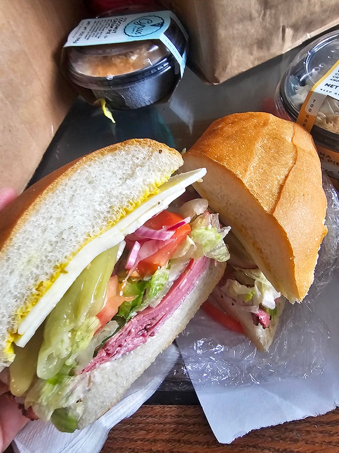 Architecture matters in sandwich construction. This beauty features perfect proportions of meat, cheese, and veggies—the Frank Lloyd Wright of lunch options.